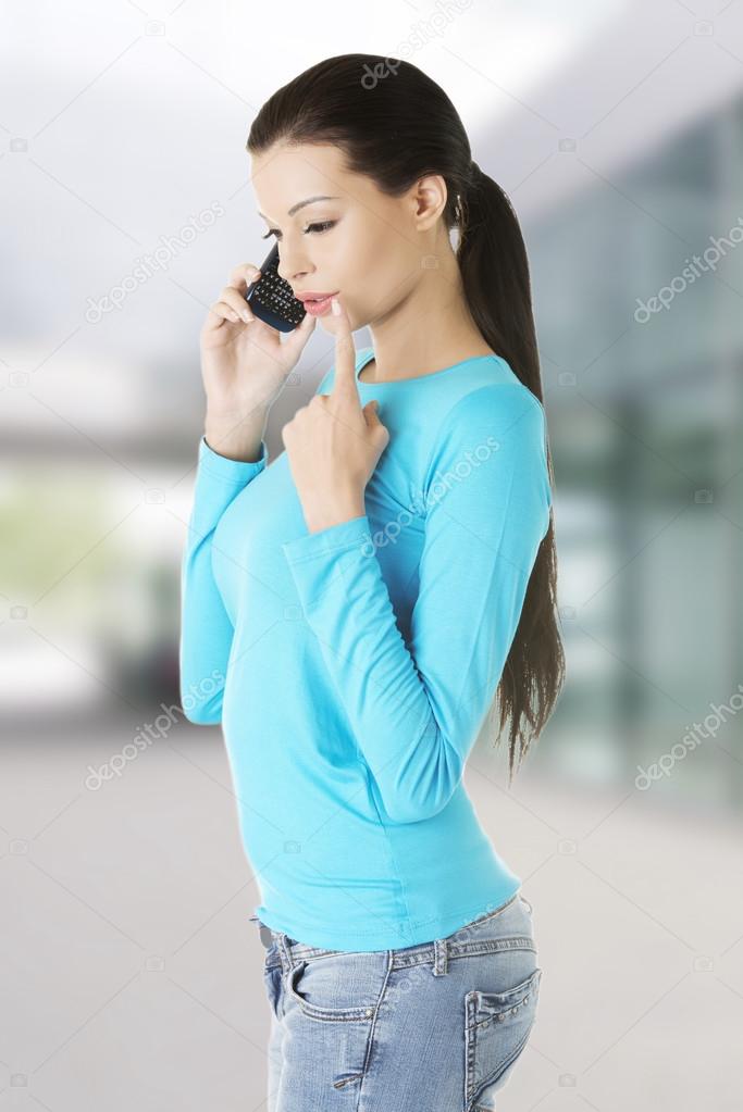 Woman calling by phone — Stock Photo © piotr_marcinski #61740387