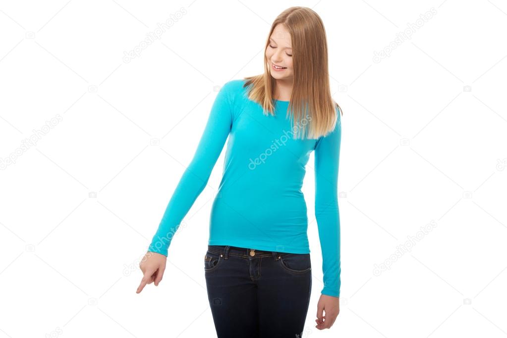 Woman pointing down Stock Photo by ©piotr_marcinski 62012967