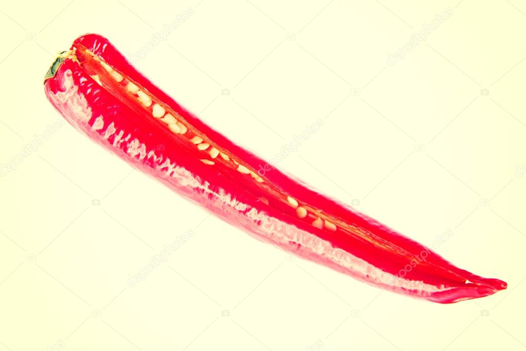 One chili pepper cut through lenght. — Stock Photo © piotr_marcinski ...