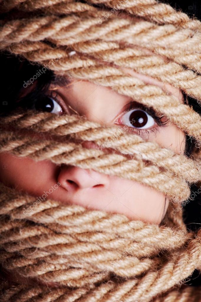 Tied up scared woman face. Stock Photo by ©piotr_marcinski 63154139