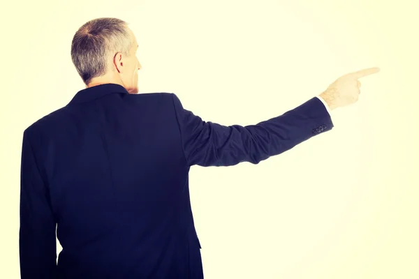 ᐈ Man pointing right stock photos, Royalty Free man pointing right ...