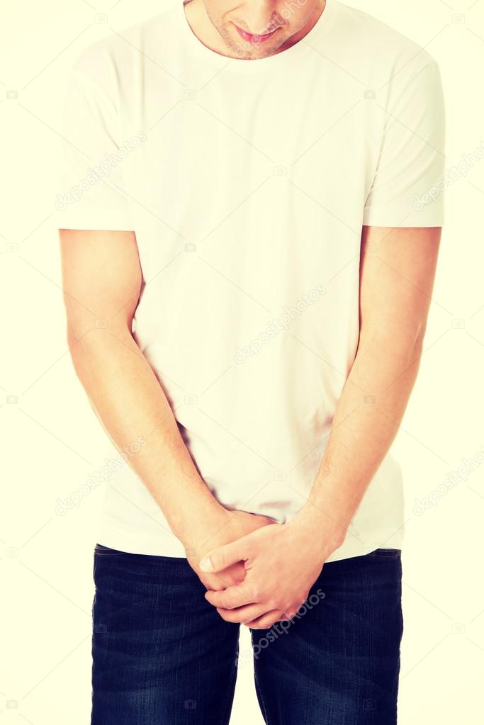 Man covering his crotch — Stock Photo © piotr_marcinski #75777277