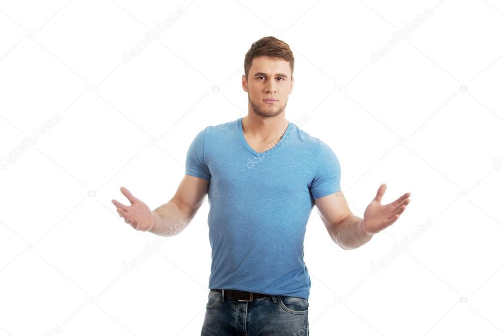 Young man with open hands. Stock Photo by ©piotr_marcinski 85891670
