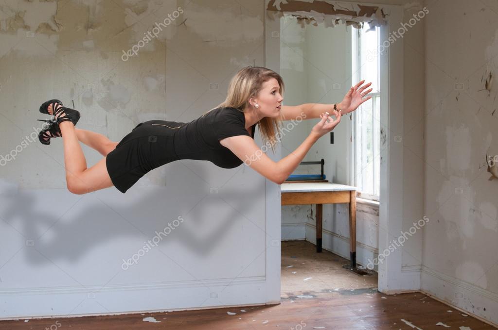 Beautiful Floating woman Stock Photo by ©robeo123 101305364