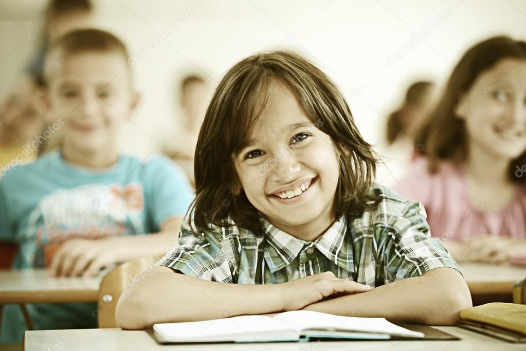Children at classroom having school lesson — Stock Photo © zurijeta ...