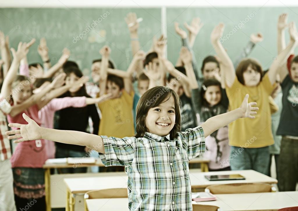 Kids at school on lessons — Stock Photo © zurijeta #98293324