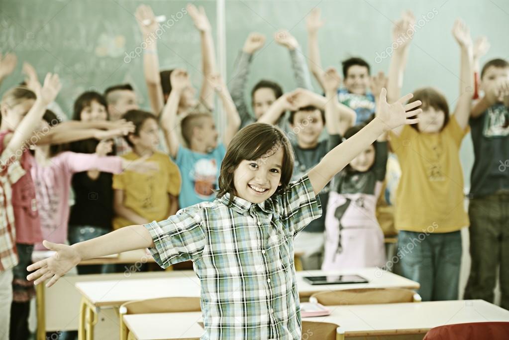 Kids at school on lessons — Stock Photo © zurijeta #98293358