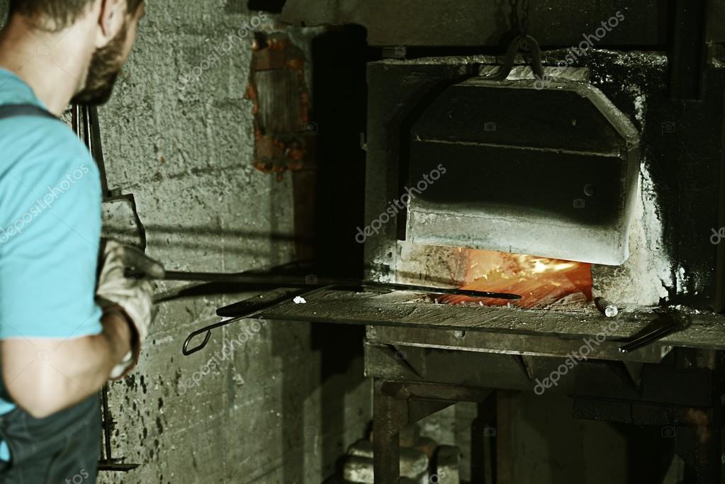 Working on iron stove factory — Stock Photo © zurijeta #98297828