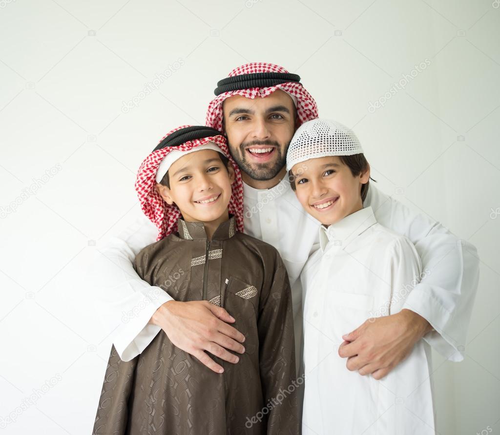 Arabic young father posing with kids — Stock Photo © zurijeta #99502974