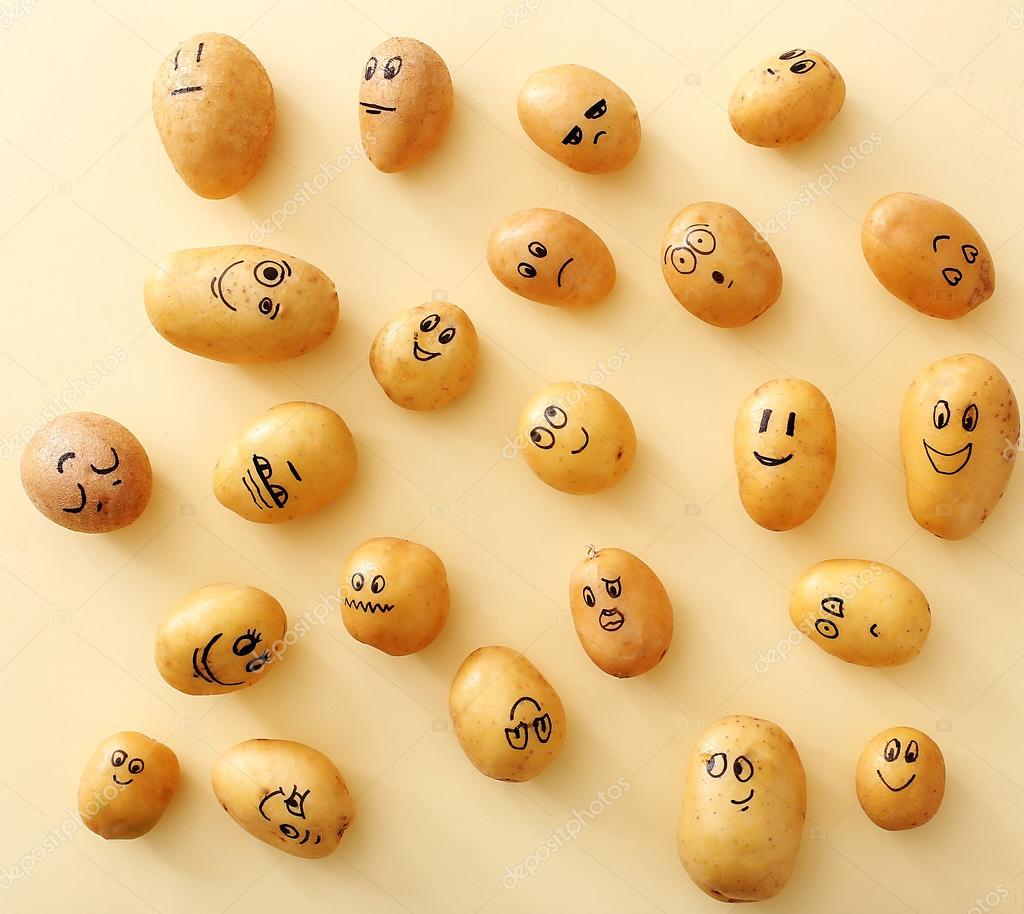 Funny faces potatoes — Stock Photo © yekophotostudio #96359602