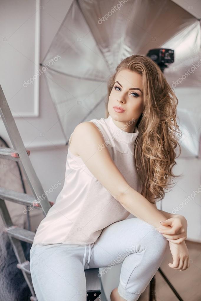 Woman posing in studio — Stock Photo © Forewer #110161410