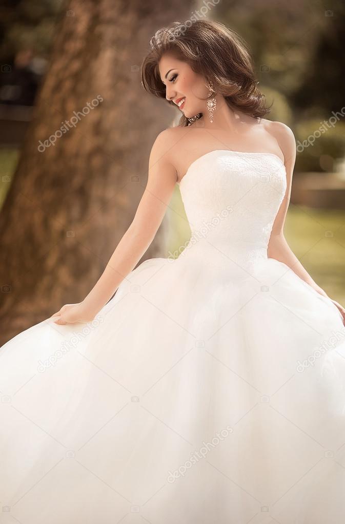 Beautiful bride beautiful bride outdoors Stock Photo by ©Forewer 70035215