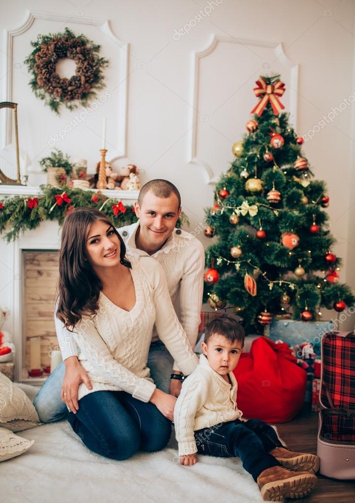 Happy family at Christmas eve — Stock Photo © Forewer #94270650