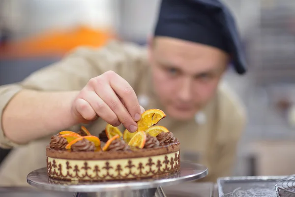 Chef preparing desert cake - Stock Image - Everypixel