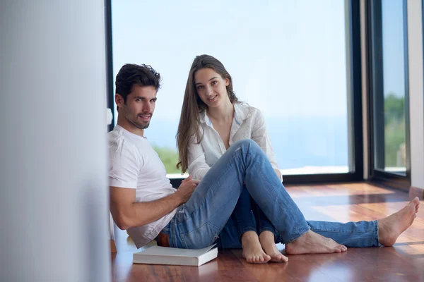 Romantic couple relaxing at home Stock Photo by ©.shock 76355685