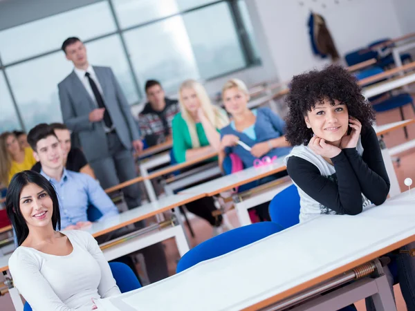 Students with teacher in computer lab classroom - Stock Image - Everypixel