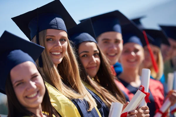 Young graduates students Stock Photo by ©.shock 80767556