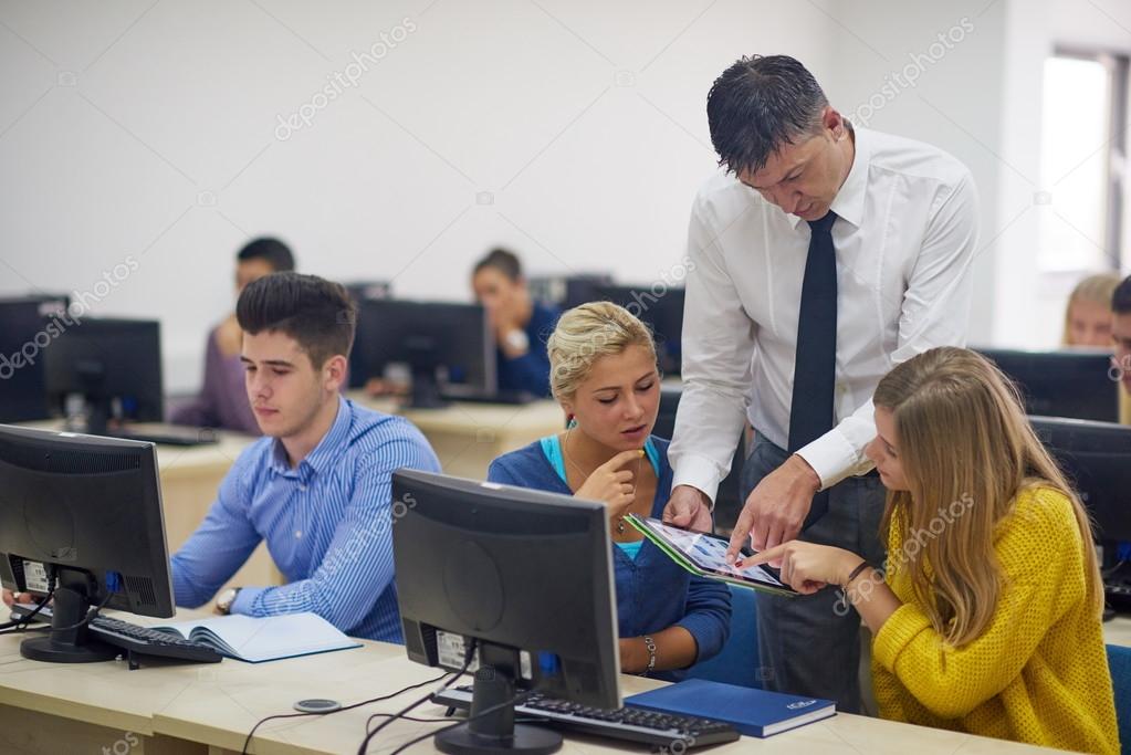 Students with teacher in computer classrom — Stock Photo © .shock #81293980