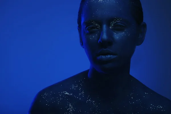 Woman with dark blue face Stock Photo by ©kanareva 69948469