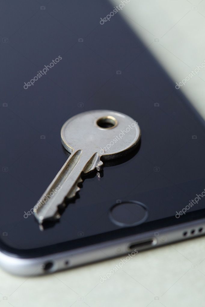 Key on the mobile phone Stock Photo by ©strelok 106460738