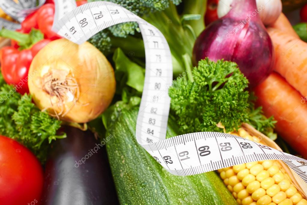 Vegetables set with measuring tape Stock Photo by ©strelok 109711658