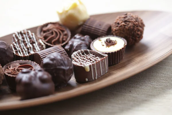Tasty chocolate sweets Stock Photo by ©strelok 71590117