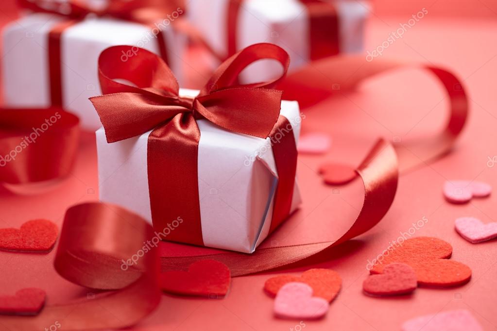 Gifts with red ribbons — Stock Photo © strelok #86512450