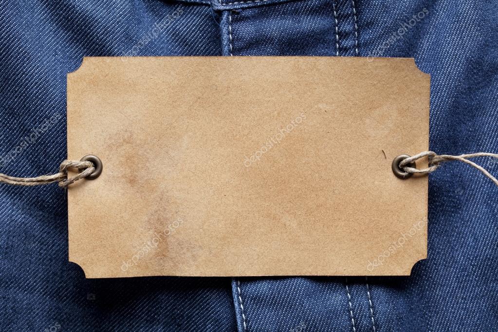 Blank paper label on jeans background — Stock Photo © digieye #117964468