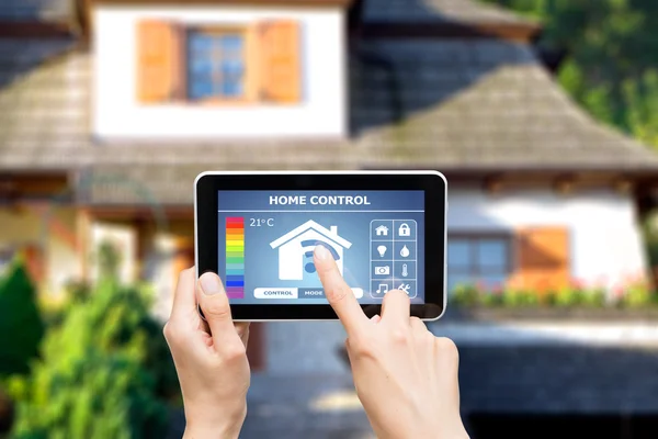 Remote home control system on a digital tablet. — Stock Photo ...
