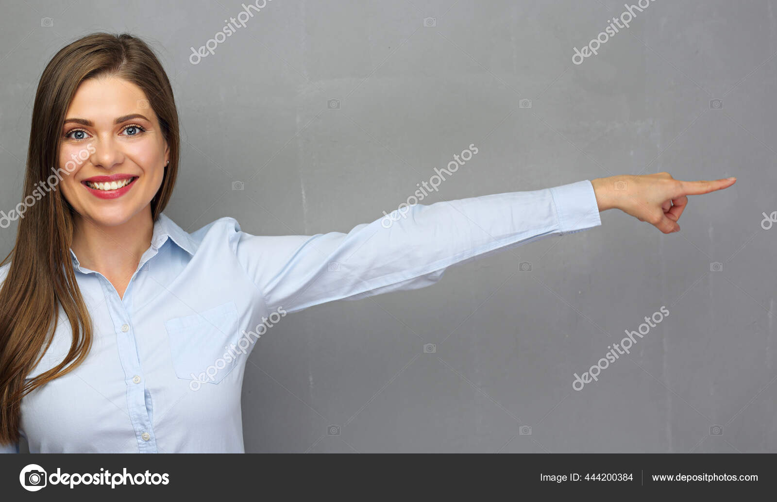 Smiling Woman Pointing Finger Copy Space Gray Wall Studio Portrait ...