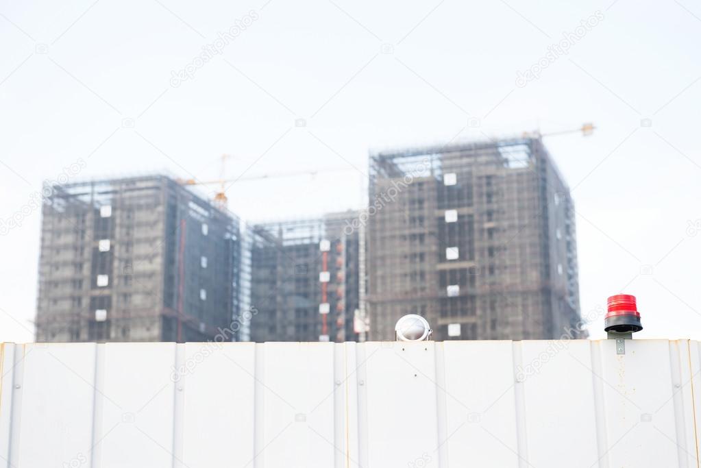 High Rise Buildings Behind Construction Fence — Stock Photo © Ansonde ...