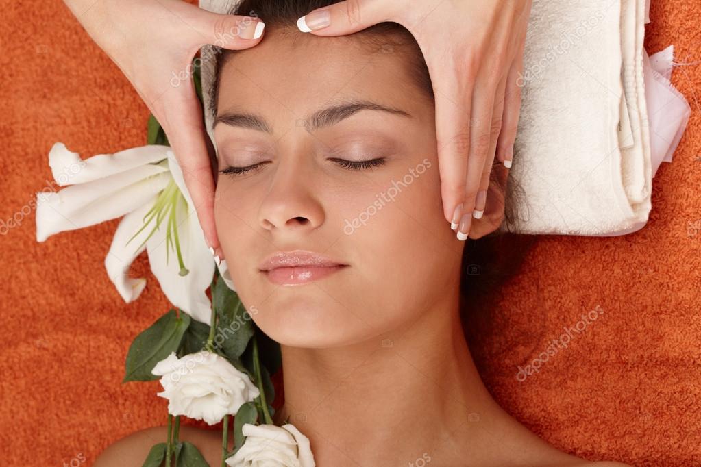 Woman getting a spa treatment — Stock Photo © mihhailov #51999087