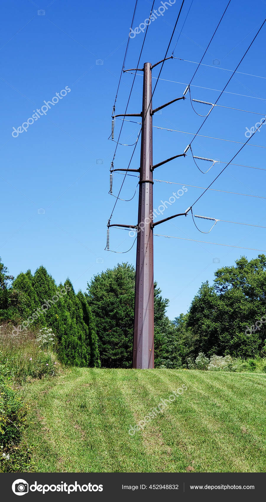 High Voltage Power Lines Cross Large Metal Pole Blue Sky Stock Photo by ...