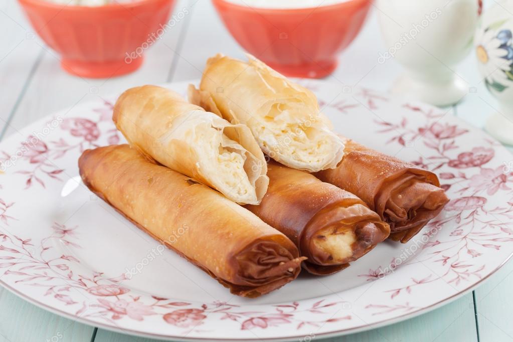 Phyllo pastry cheese rolls Stock Photo by ©igordutina 110828602