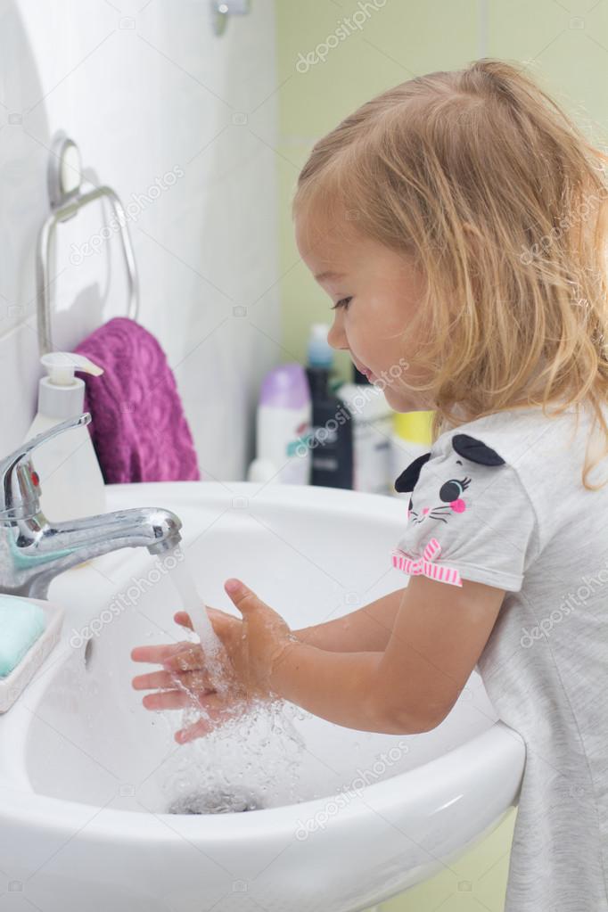 Little girl washing hands Stock Photo by ©MitaStockImages 51865373 Little girl washing hands Stock Photo by ©MitaStockImages 51865373