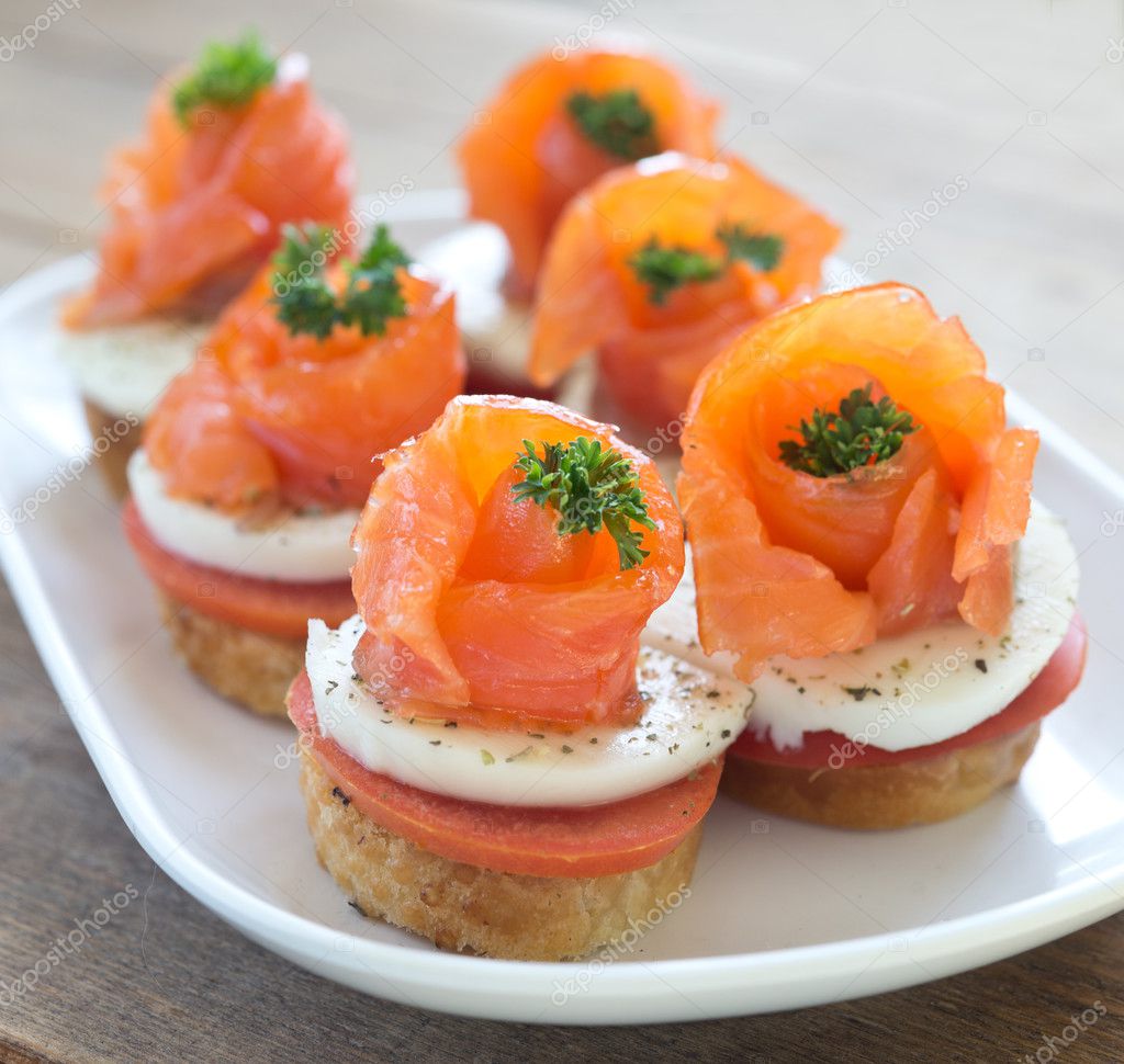 Canapes with red fish Stock Photo by ©ruslanchik 104648316
