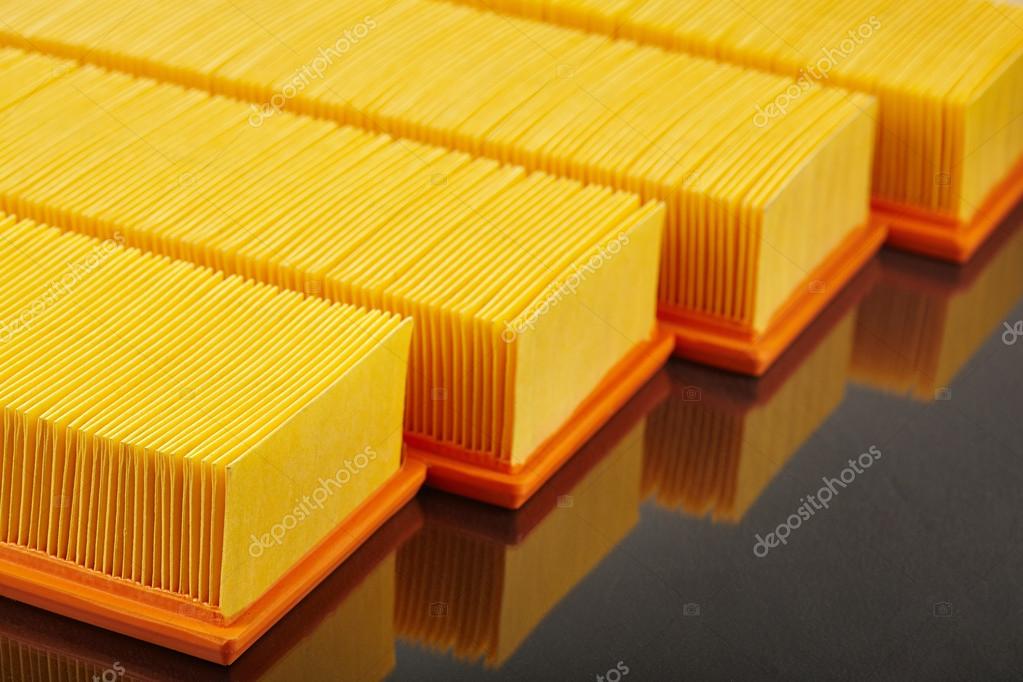 Car filter on bright background Stock Photo by ©ababaka 108339684