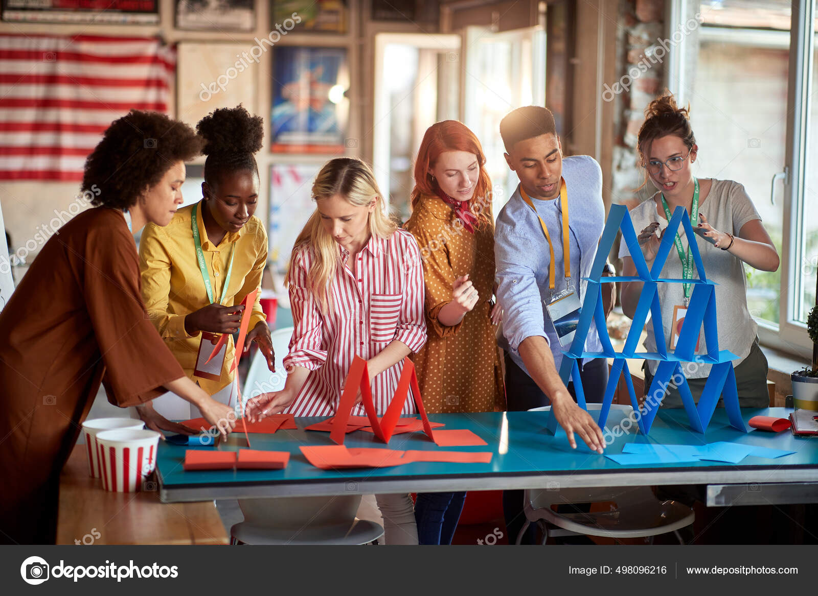 Two Groups Employees Making Paper Towers Work Separated Different ...