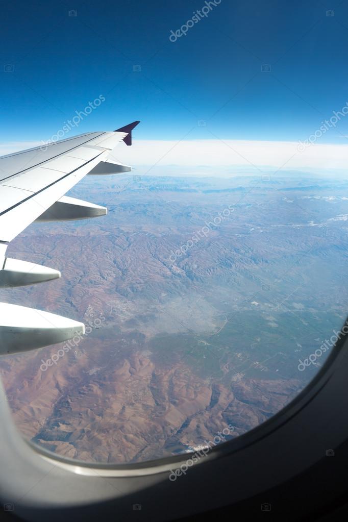 Beautiful view from plane window Stock Photo by ©luckybusiness 87140978