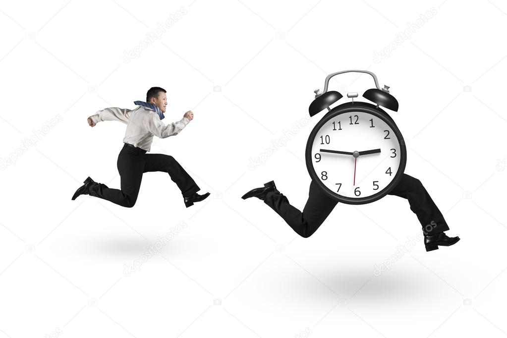 Hombre corriendo tras reloj despertador de piernas corriendo ...