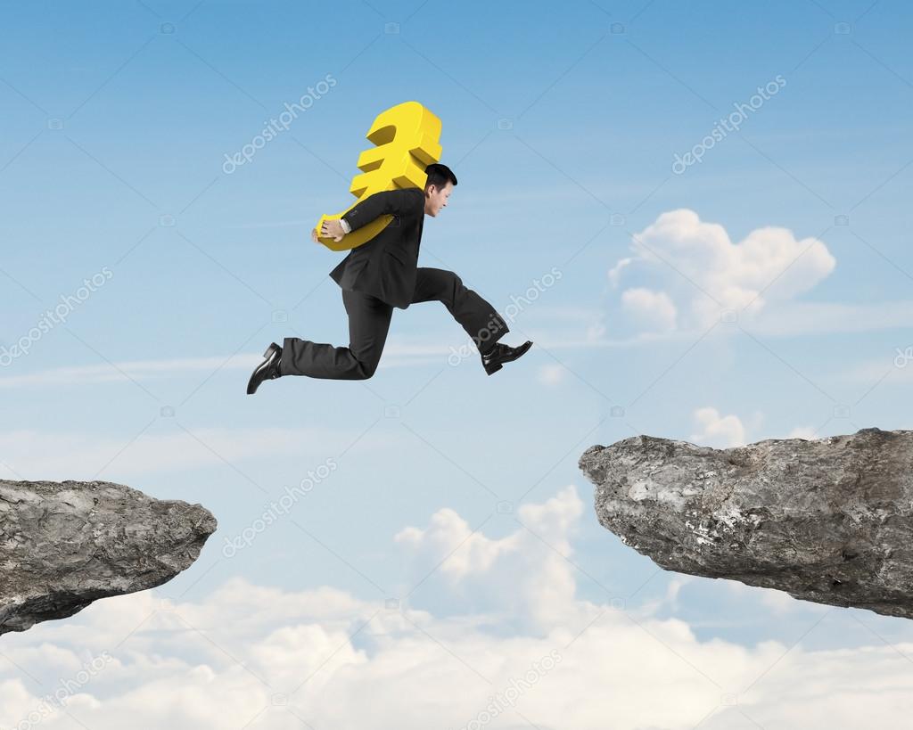 Man carrying euro sign jumping over two cliffs — Stock Photo © bruesw ...