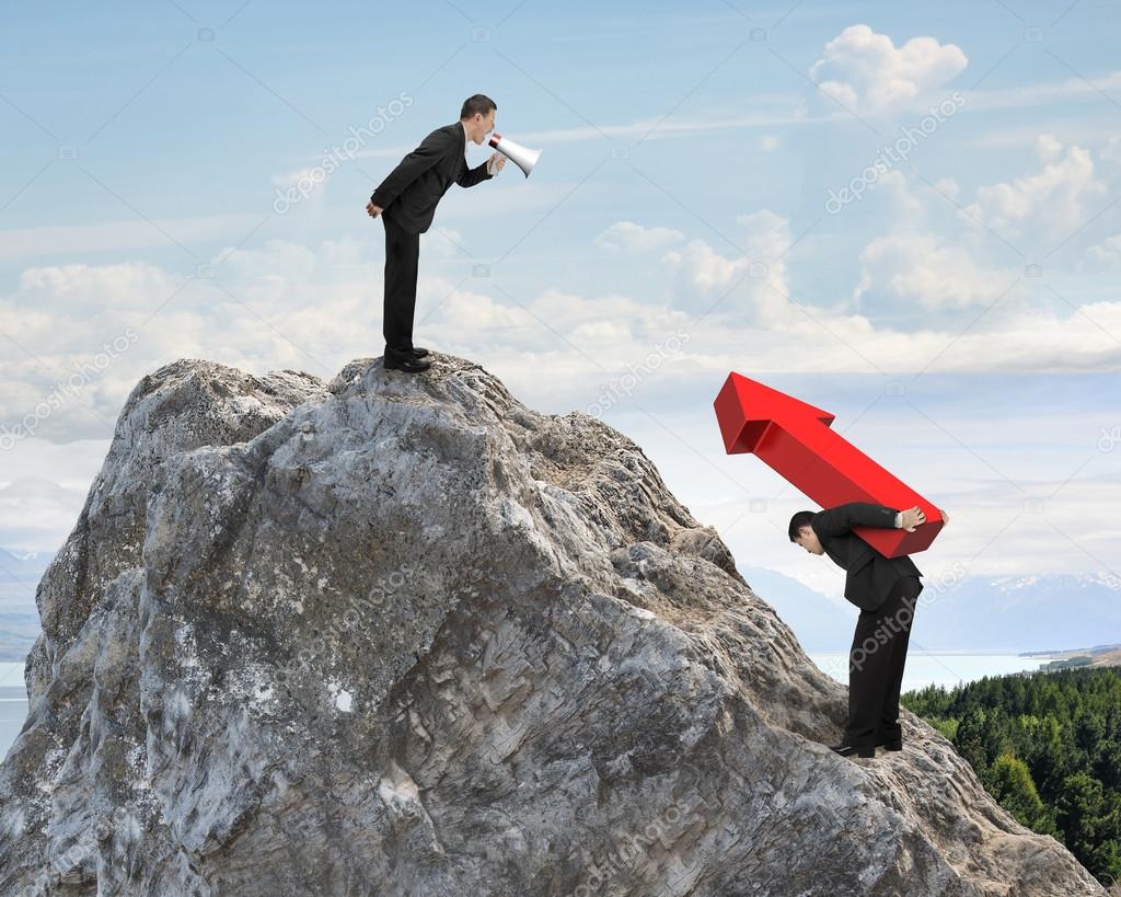 Boss using megaphone commanding employee carrying arrow sign wit Stock ...