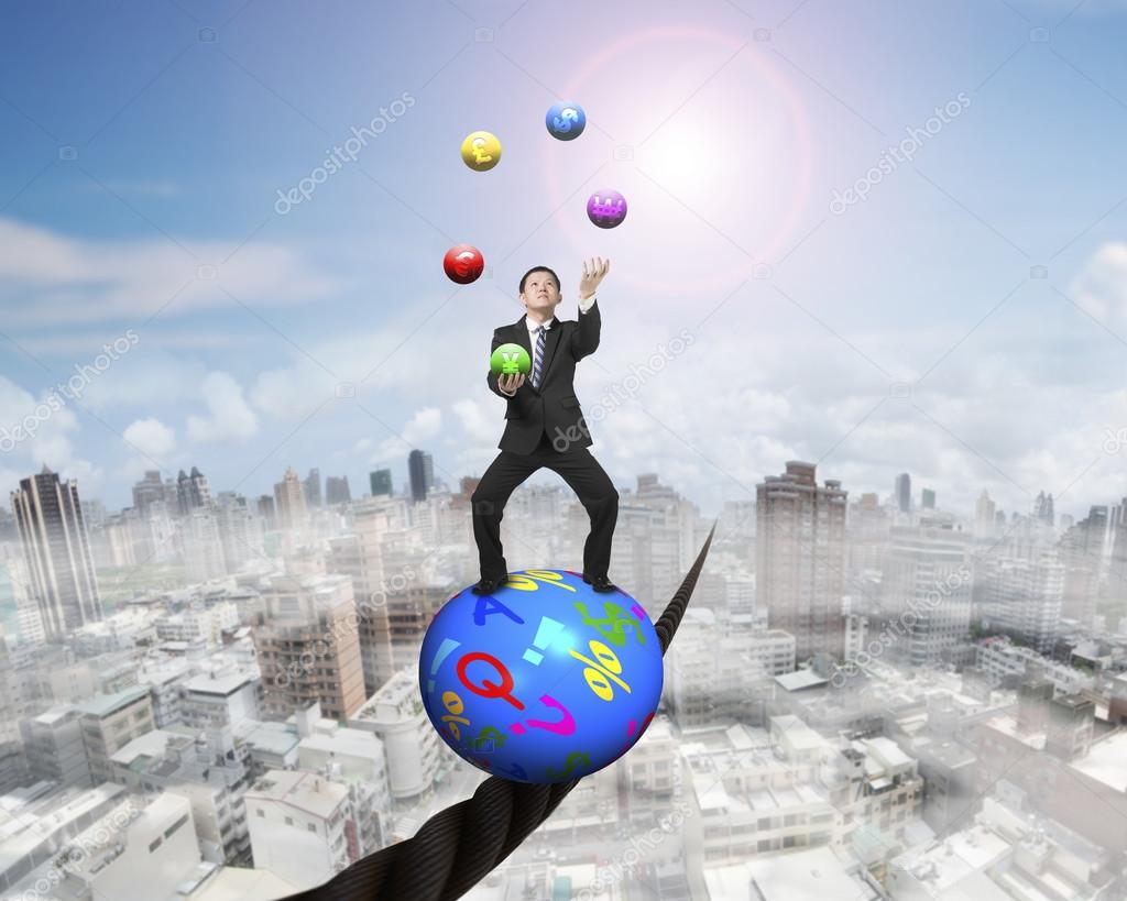 Juggling businessman standing on symbols ball balancing on wire Stock ...