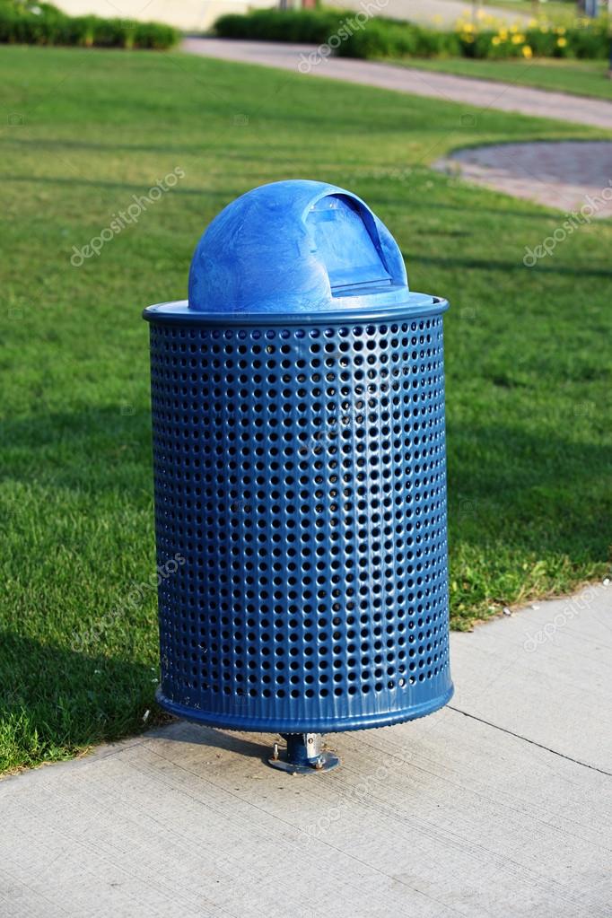 Blue Trash Can in park — Stock Photo © melking #53031645