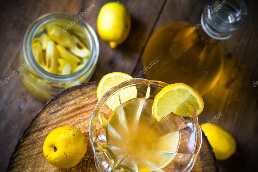 Alcohol quince liqueur sliced fruit prepare wooden setting — Stock ...