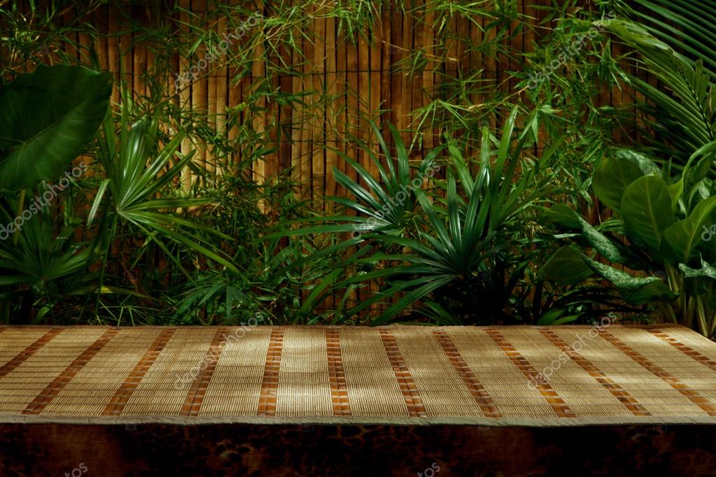 Spa background. View of tropical green foliage with bamboo mat Stock ...