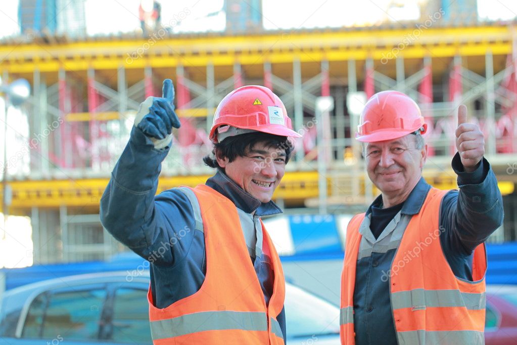 Two workers on construction site – Stock Editorial Photo © Omstudio ...