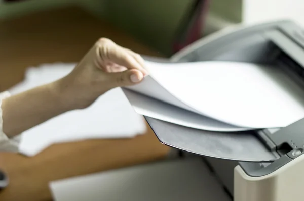 Process of the press of paper — Stock Photo © gorvik #58809189