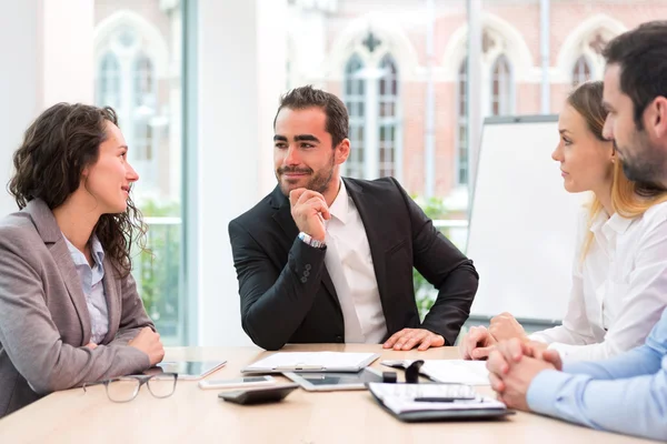 Boss heading a business reunion with partners - Stock Image - Everypixel