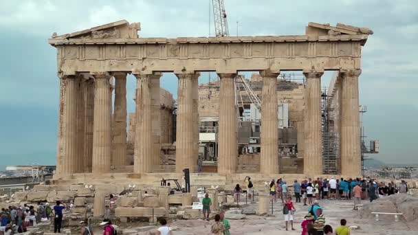 People near Parthenon - ancient temple in Athenian Acropolis, Greece ...